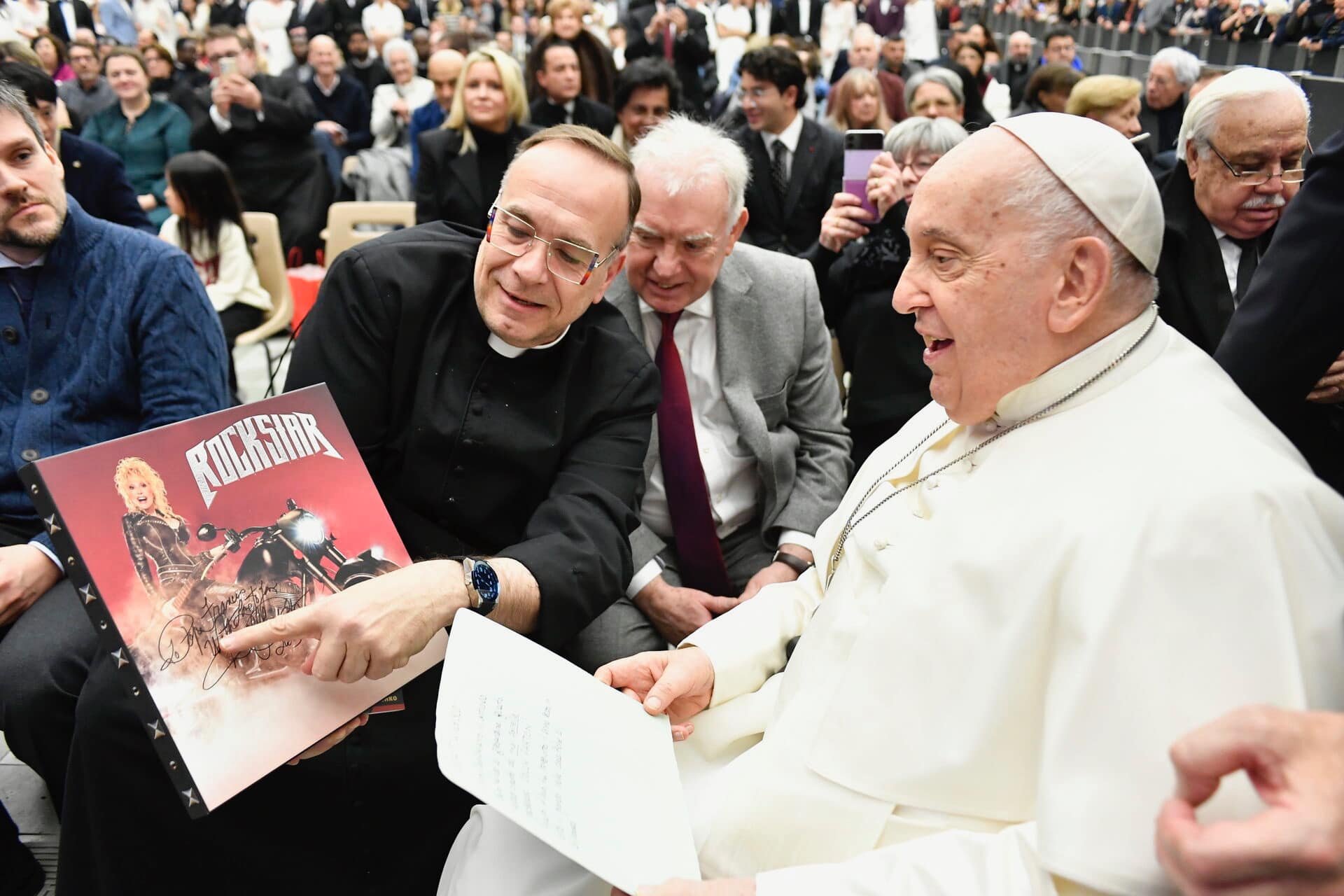 Father Jim Delivers Gift - KOGT